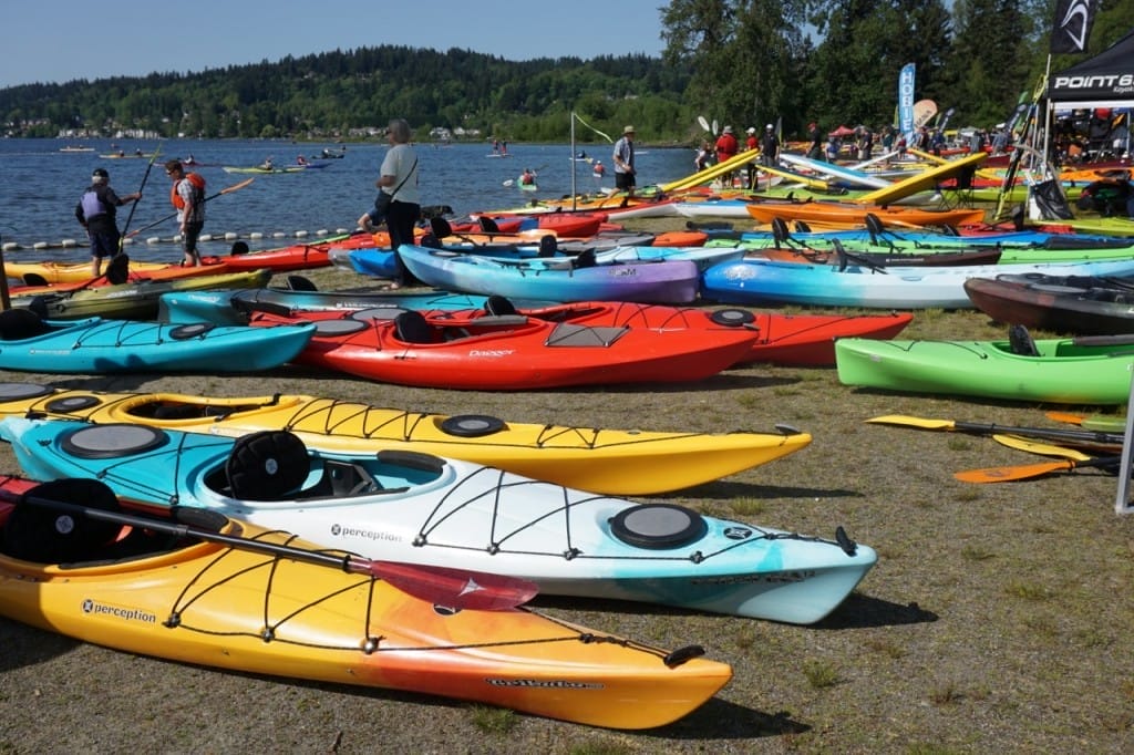 Colorful kayaks on the beach at Lake Sammamish State Park - Mountains ...